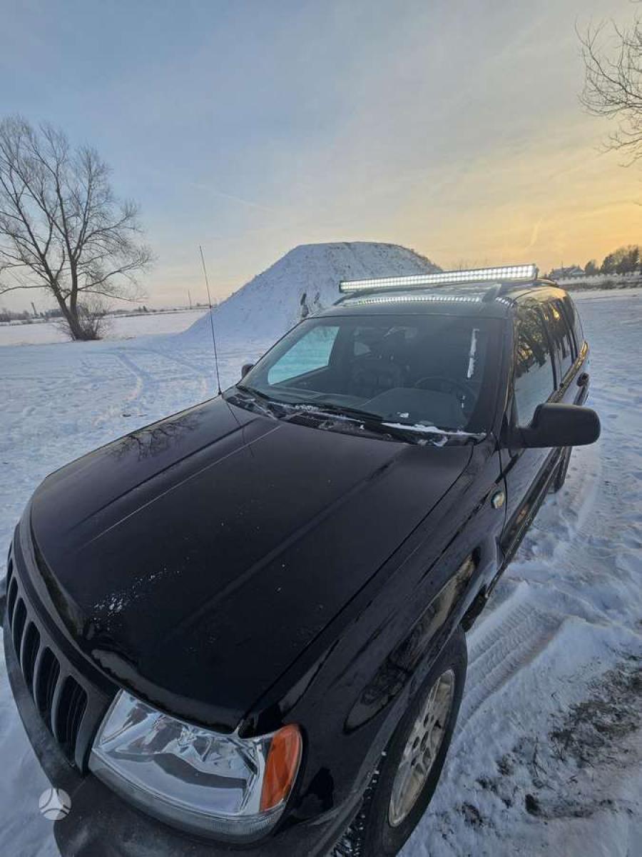 Черный Джип Гранд Чероки 2001 в Паневежис, объемом двигателя 4.70 л и пробегом 206 тыс. км за 3700 €, фото 14 на AUTOMOTO.COM.LV