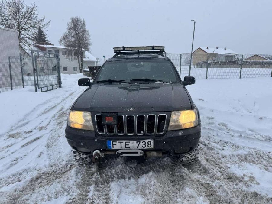 Melns Jeep Grand Cherokee 2001 Jonava, ar dzinēja tilpumu 3.12 L un nobraukumu 200 tūkst. km par 1900 €, foto 1 vietnē AUTOMOTO.COM.LV