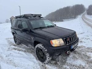 Melns Jeep Grand Cherokee 2001 Jonava, ar dzinēja tilpumu 3.12 L un nobraukumu 200 tūkst. km par 1900 €, foto 2 vietnē AUTOMOTO.COM.LV