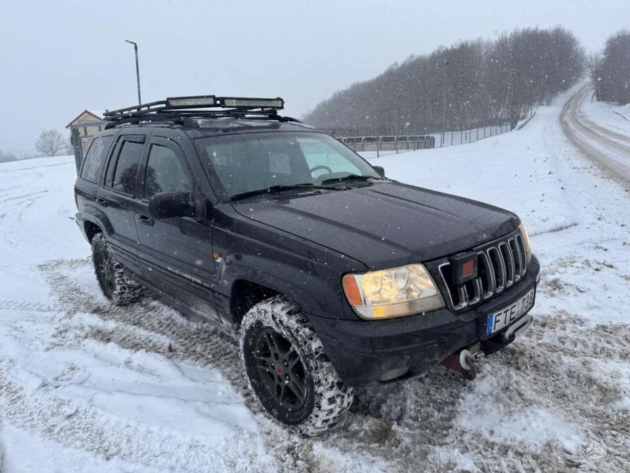 Melns Jeep Grand Cherokee 2001 Jonava, ar dzinēja tilpumu 3.12 L un nobraukumu 200 tūkst. km par 1900 €, foto 2 vietnē AUTOMOTO.COM.LV