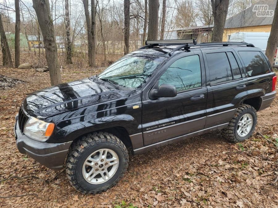 Melns Jeep Grand Cherokee 2001 Panevēža, ar dzinēja tilpumu 4.70 L un nobraukumu 207 tūkst. km par 4500 €, foto 1 vietnē AUTOMOTO.COM.LV