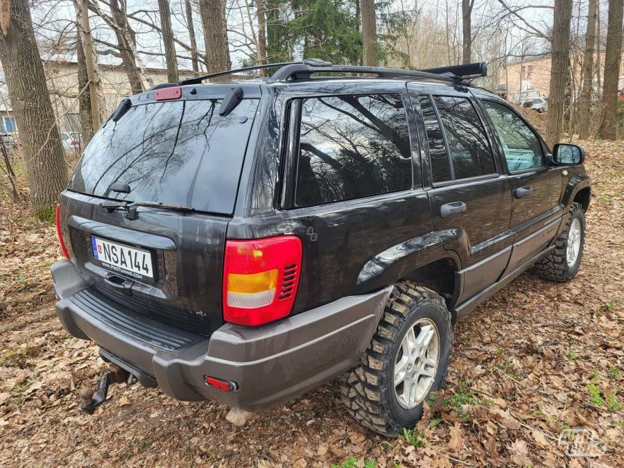 Melns Jeep Grand Cherokee 2001 Panevēža, ar dzinēja tilpumu 4.70 L un nobraukumu 207 tūkst. km par 4500 €, foto 6 vietnē AUTOMOTO.COM.LV
