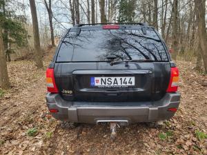 Melns Jeep Grand Cherokee 2001 Panevēža, ar dzinēja tilpumu 4.70 L un nobraukumu 207 tūkst. km par 4500 €, foto 7 vietnē AUTOMOTO.COM.LV