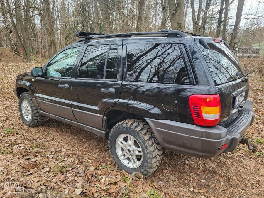 Melns Jeep Grand Cherokee 2001 Panevēža, ar dzinēja tilpumu 4.70 L un nobraukumu 207 tūkst. km par 4500 €, foto 8 vietnē AUTOMOTO.COM.LV