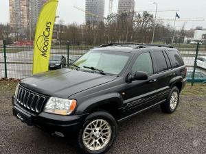Black Jeep Grand Cherokee 2002 in Vilnius, with an engine capacity of 2.69 L and mileage of 242 thousand km for 3100 €, photo  on AUTOMOTO.COM.LV