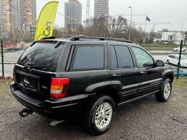 Black Jeep Grand Cherokee 2002 in Vilnius, with an engine capacity of 2.69 L and mileage of 242 thousand km for 3100 €, photo 5 on AUTOMOTO.COM.LV