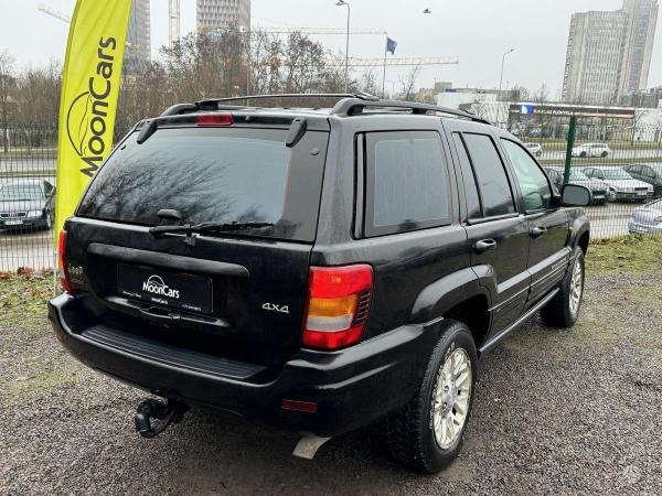 Black Jeep Grand Cherokee 2002 in Vilnius, with an engine capacity of 2.69 L and mileage of 242 thousand km for 3100 €, photo 6 on AUTOMOTO.COM.LV