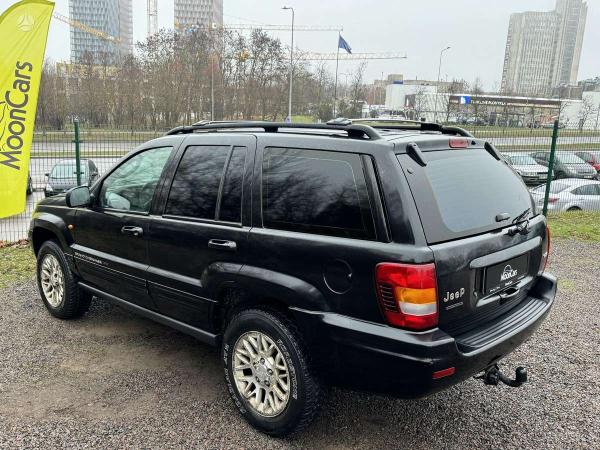 Black Jeep Grand Cherokee 2002 in Vilnius, with an engine capacity of 2.69 L and mileage of 242 thousand km for 3100 €, photo 7 on AUTOMOTO.COM.LV