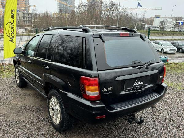 Black Jeep Grand Cherokee 2002 in Vilnius, with an engine capacity of 2.69 L and mileage of 242 thousand km for 3100 €, photo 8 on AUTOMOTO.COM.LV