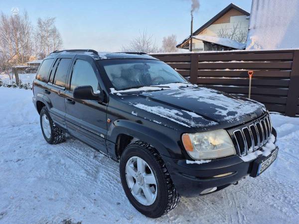 Black Jeep Grand Cherokee 2002 in Vilnius, with an engine capacity of 4.70 L and mileage of 340 thousand km for 3300 €, photo 1 on AUTOMOTO.COM.LV
