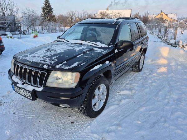 Black Jeep Grand Cherokee 2002 in Vilnius, with an engine capacity of 4.70 L and mileage of 340 thousand km for 3300 €, photo 4 on AUTOMOTO.COM.LV