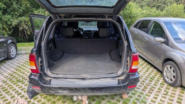 Melns Jeep Grand Cherokee 2002 Viļņa, ar dzinēja tilpumu 2.69 L un nobraukumu 545 tūkst. km par 1700 €, foto 6 vietnē AUTOMOTO.COM.LV