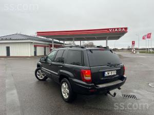 Melns Jeep Grand Cherokee 2003 Rīga, ar dzinēja tilpumu 2.70 L un nobraukumu 380 tūkst. km par 3000 €, foto 9 vietnē AUTOMOTO.COM.LV