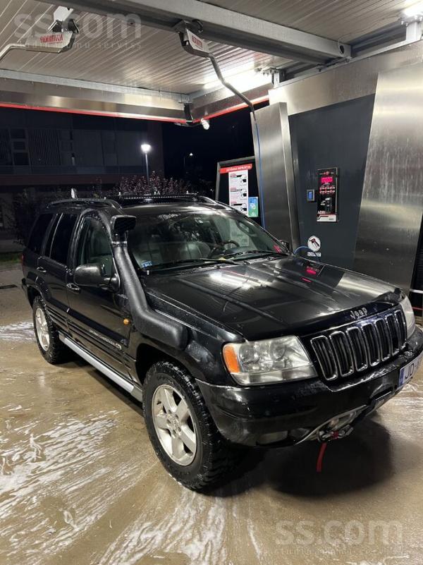 Melns Jeep Grand Cherokee 2003 Jelgava, ar dzinēja tilpumu 2.70 L un nobraukumu 284 tūkst. km par 3000 €, foto 1 vietnē AUTOMOTO.COM.LV