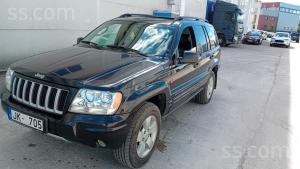 Melns Jeep Grand Cherokee 2003 Rīga, ar dzinēja tilpumu 2.70 L un nobraukumu 0 tūkst. km par 3190 €, foto  vietnē AUTOMOTO.COM.LV