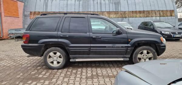 Melns Jeep Grand Cherokee 2003 Valmiera, ar dzinēja tilpumu 2.70 L un nobraukumu 312 tūkst. km par 2700 €, foto 2 vietnē AUTOMOTO.COM.LV