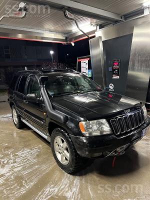 Melns Jeep Grand Cherokee 2003 Rīga, ar dzinēja tilpumu 2.70 L un nobraukumu 287 tūkst. km par 2000 €, foto  vietnē AUTOMOTO.COM.LV