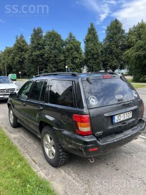 Melns Jeep Grand Cherokee 2003 Rīga, ar dzinēja tilpumu 2.70 L un nobraukumu 287 tūkst. km par 2000 €, foto 7 vietnē AUTOMOTO.COM.LV
