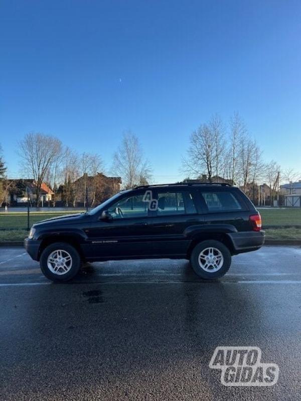 Black Jeep Grand Cherokee 2004 in Kaunas, with an engine capacity of 2.70 L and mileage of 238 thousand km for 4750 €, photo 1 on AUTOMOTO.COM.LV