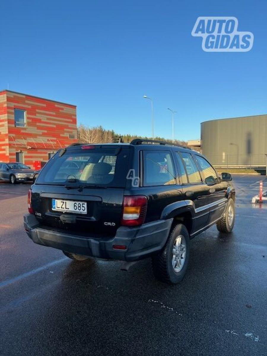Melns Jeep Grand Cherokee 2004 Kauņa, ar dzinēja tilpumu 2.70 L un nobraukumu 238 tūkst. km par 4750 €, foto 6 vietnē AUTOMOTO.COM.LV