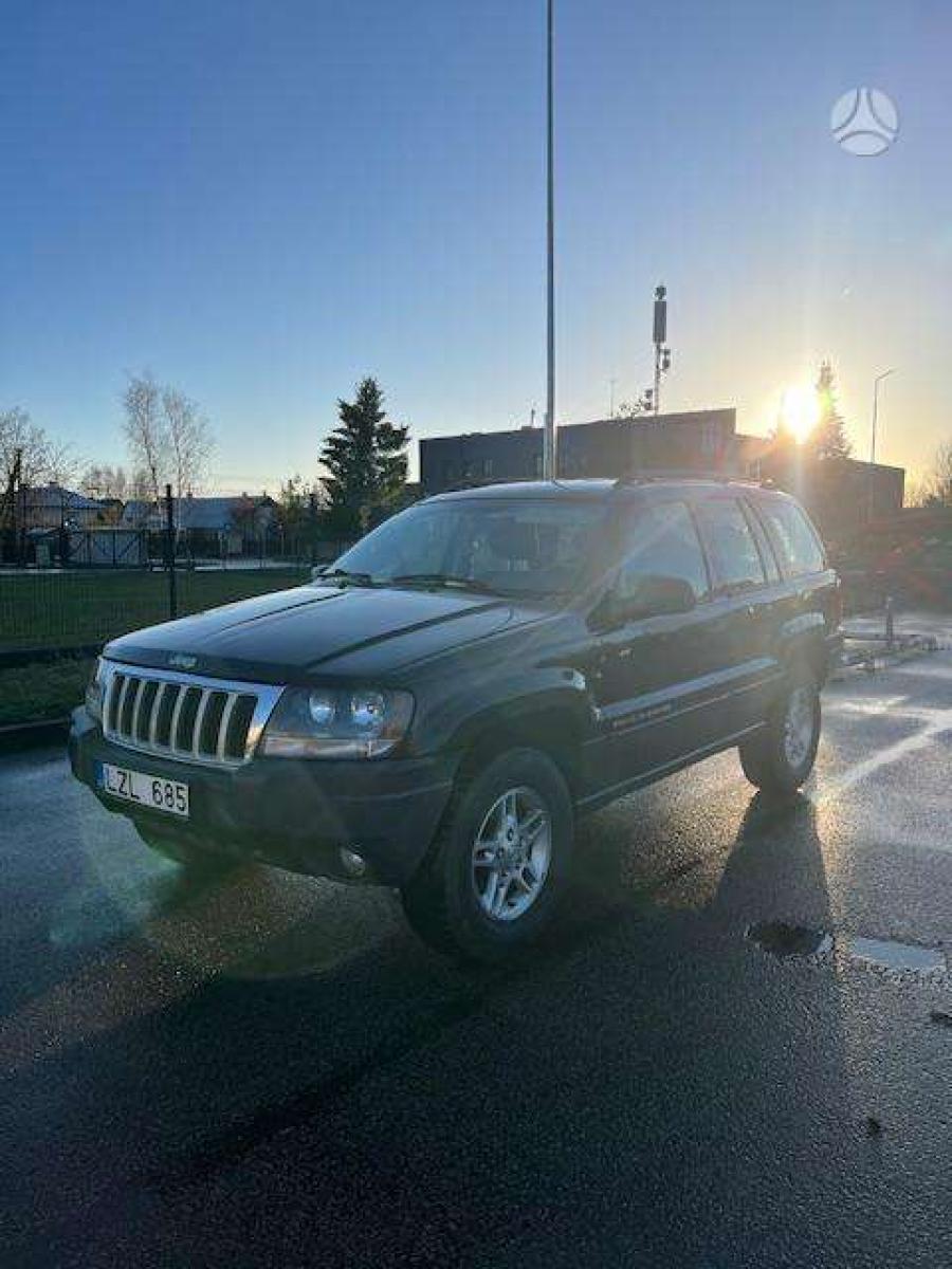 Melns Jeep Grand Cherokee 2004 Kauņa, ar dzinēja tilpumu 2.69 L un nobraukumu 238 tūkst. km par 4495 €, foto 1 vietnē AUTOMOTO.COM.LV