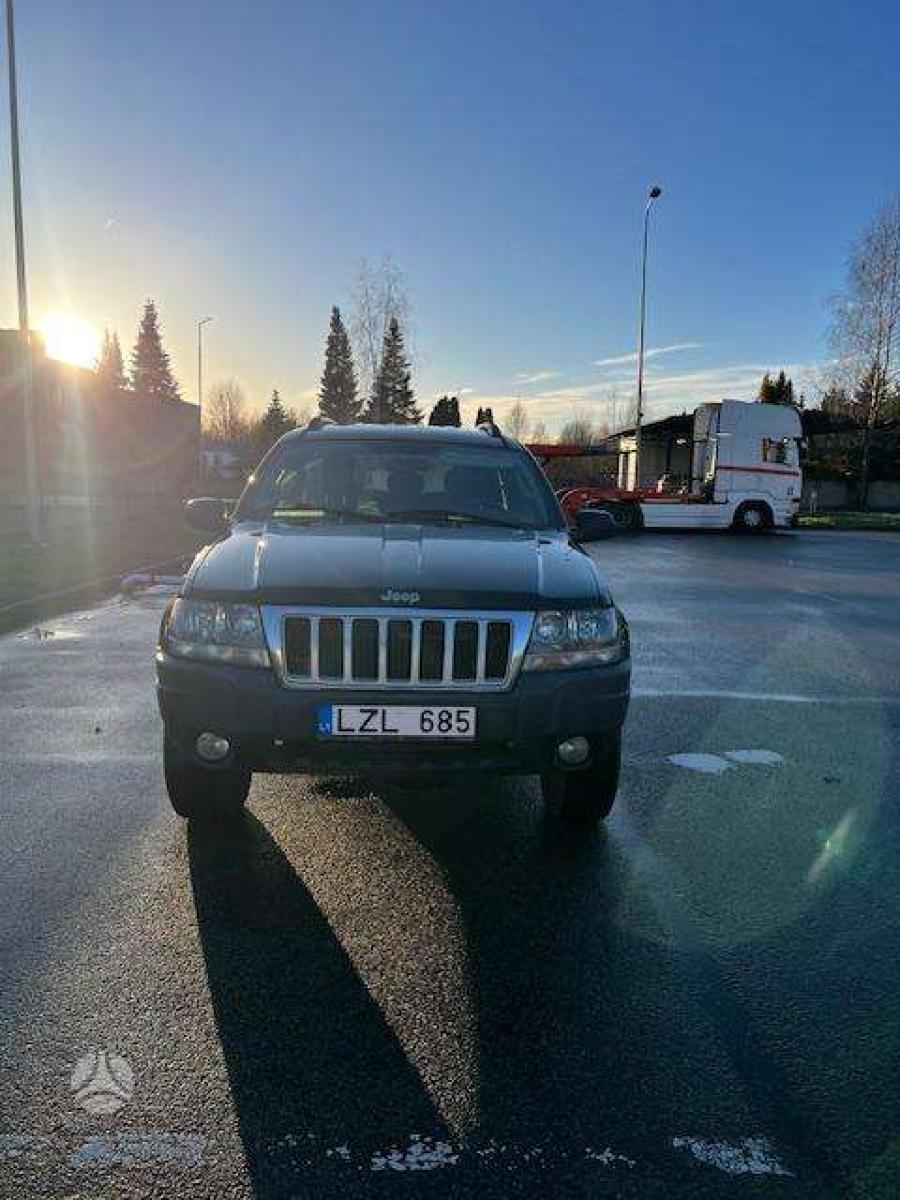 Melns Jeep Grand Cherokee 2004 Kauņa, ar dzinēja tilpumu 2.69 L un nobraukumu 238 tūkst. km par 4495 €, foto 2 vietnē AUTOMOTO.COM.LV