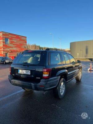 Melns Jeep Grand Cherokee 2004 Kauņa, ar dzinēja tilpumu 2.69 L un nobraukumu 238 tūkst. km par 4495 €, foto 5 vietnē AUTOMOTO.COM.LV