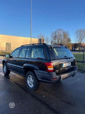 Melns Jeep Grand Cherokee 2004 Kauņa, ar dzinēja tilpumu 2.69 L un nobraukumu 238 tūkst. km par 4495 €, foto 7 vietnē AUTOMOTO.COM.LV