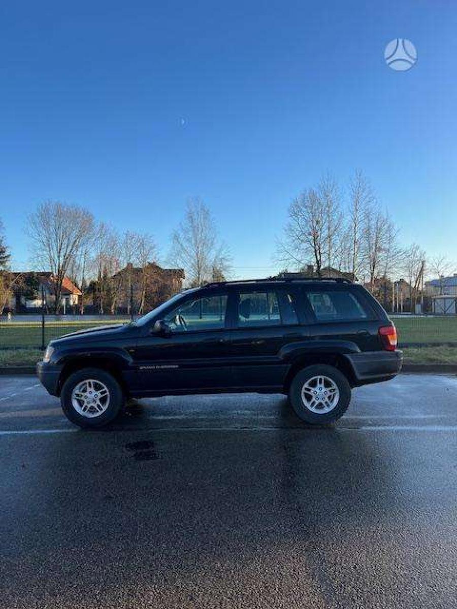Melns Jeep Grand Cherokee 2004 Kauņa, ar dzinēja tilpumu 2.69 L un nobraukumu 238 tūkst. km par 4495 €, foto 8 vietnē AUTOMOTO.COM.LV