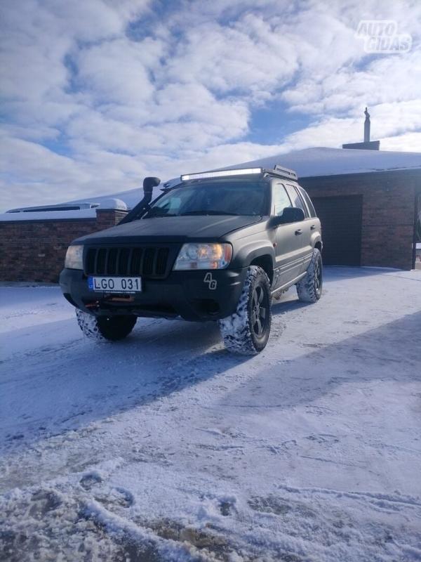 Black Jeep Grand Cherokee 2004 in Jonava, with an engine capacity of 2.70 L and mileage of 312 thousand km for 5500 €, photo 1 on AUTOMOTO.COM.LV