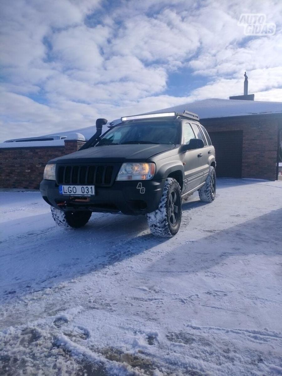 Melns Jeep Grand Cherokee 2004 Jonava, ar dzinēja tilpumu 2.70 L un nobraukumu 312 tūkst. km par 5500 €, foto 1 vietnē AUTOMOTO.COM.LV