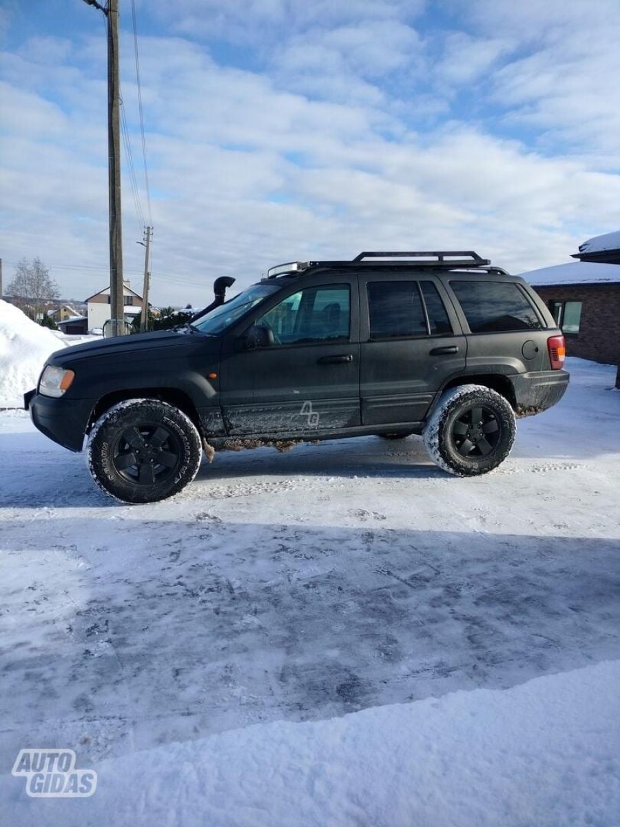 Melns Jeep Grand Cherokee 2004 Jonava, ar dzinēja tilpumu 2.70 L un nobraukumu 312 tūkst. km par 5500 €, foto 2 vietnē AUTOMOTO.COM.LV