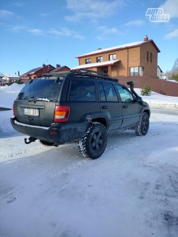 Black Jeep Grand Cherokee 2004 in Jonava, with an engine capacity of 2.70 L and mileage of 312 thousand km for 5500 €, photo 5 on AUTOMOTO.COM.LV