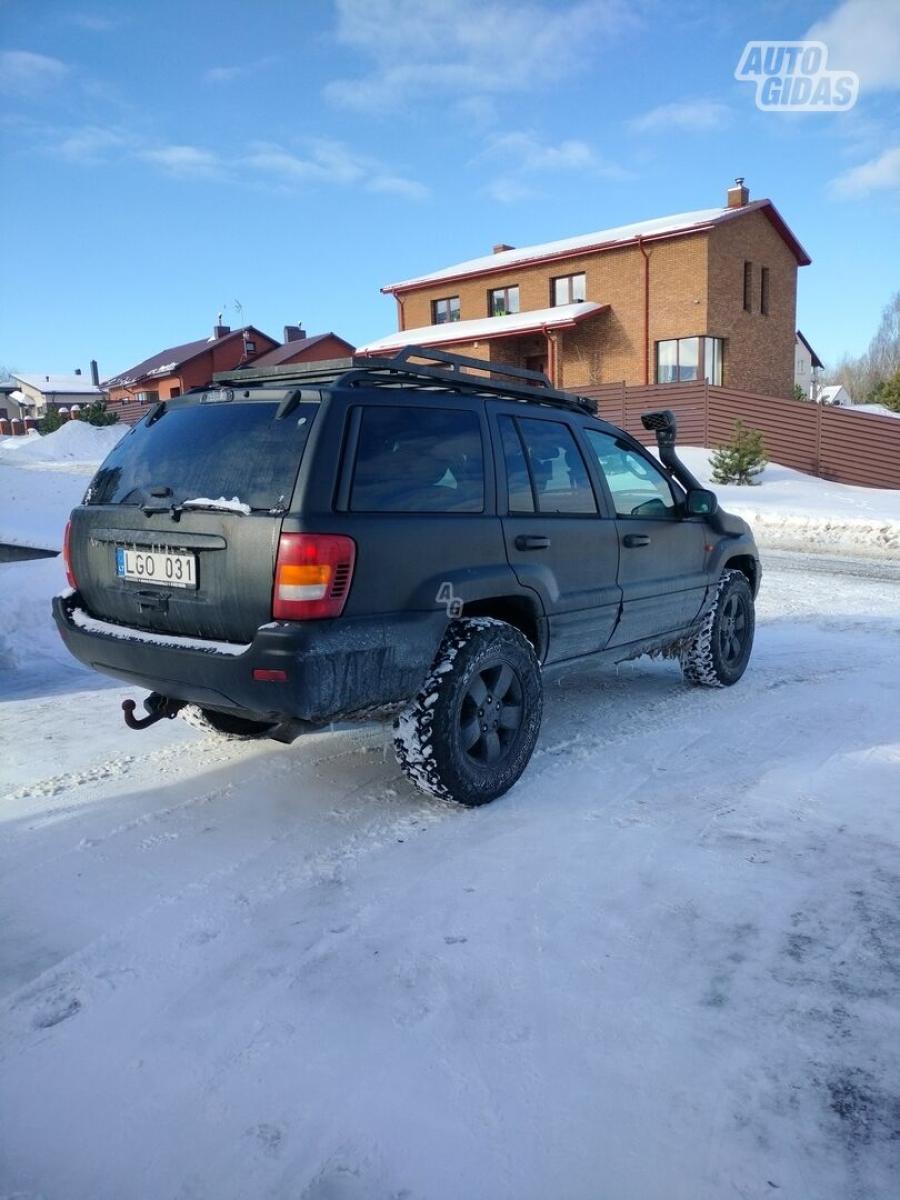 Melns Jeep Grand Cherokee 2004 Jonava, ar dzinēja tilpumu 2.70 L un nobraukumu 312 tūkst. km par 5500 €, foto 5 vietnē AUTOMOTO.COM.LV