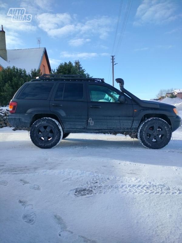 Black Jeep Grand Cherokee 2004 in Jonava, with an engine capacity of 2.70 L and mileage of 312 thousand km for 5500 €, photo 6 on AUTOMOTO.COM.LV