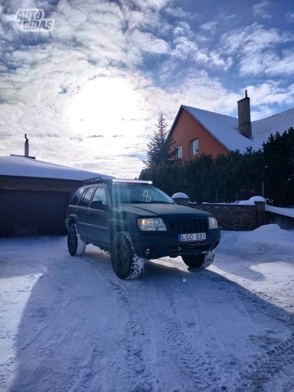 Black Jeep Grand Cherokee 2004 in Jonava, with an engine capacity of 2.70 L and mileage of 312 thousand km for 5500 €, photo 7 on AUTOMOTO.COM.LV