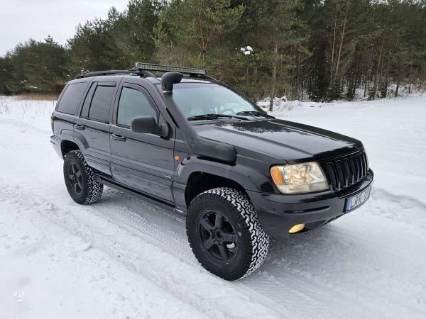 Black Jeep Grand Cherokee 2004 in Vilnius, with an engine capacity of 2.70 L and mileage of 196 thousand km for 6200 €, photo 2 on AUTOMOTO.COM.LV