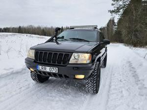 Melns Jeep Grand Cherokee 2004 Viļņa, ar dzinēja tilpumu 2.70 L un nobraukumu 196 tūkst. km par 6200 €, foto 4 vietnē AUTOMOTO.COM.LV