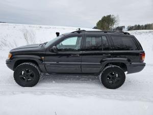 Melns Jeep Grand Cherokee 2004 Viļņa, ar dzinēja tilpumu 2.70 L un nobraukumu 196 tūkst. km par 6200 €, foto 7 vietnē AUTOMOTO.COM.LV