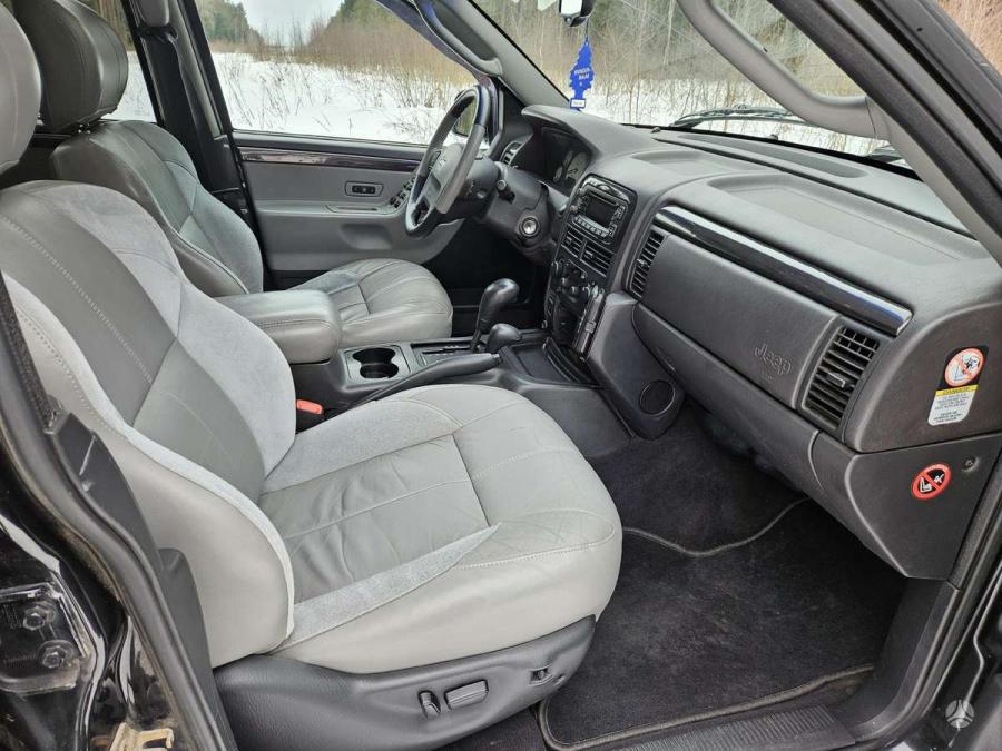 Melns Jeep Grand Cherokee 2004 Viļņa, ar dzinēja tilpumu 2.70 L un nobraukumu 196 tūkst. km par 6200 €, foto 14 vietnē AUTOMOTO.COM.LV