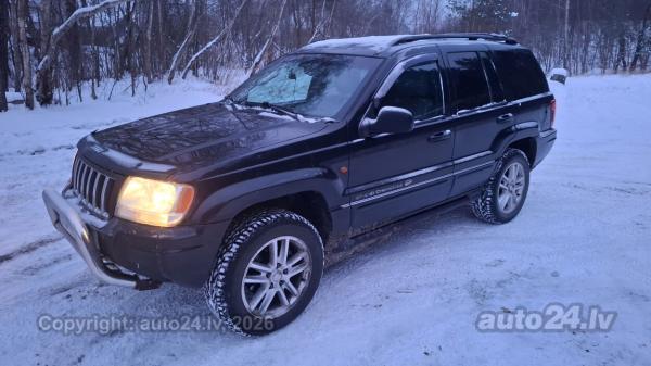 Melns Jeep Grand Cherokee 2004 Tallina, ar dzinēja tilpumu 2.70 L un nobraukumu 345 tūkst. km par 4999 €, foto 2 vietnē AUTOMOTO.COM.LV