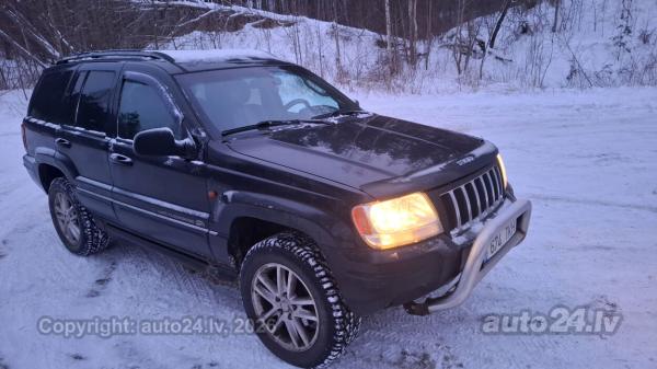 Melns Jeep Grand Cherokee 2004 Tallina, ar dzinēja tilpumu 2.70 L un nobraukumu 345 tūkst. km par 4999 €, foto 4 vietnē AUTOMOTO.COM.LV
