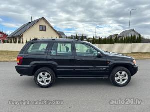 Black Jeep Grand Cherokee 2004 in Tallinn, with an engine capacity of 2.70 L and mileage of 330 thousand km for 3400 €, photo 4 on AUTOMOTO.COM.LV