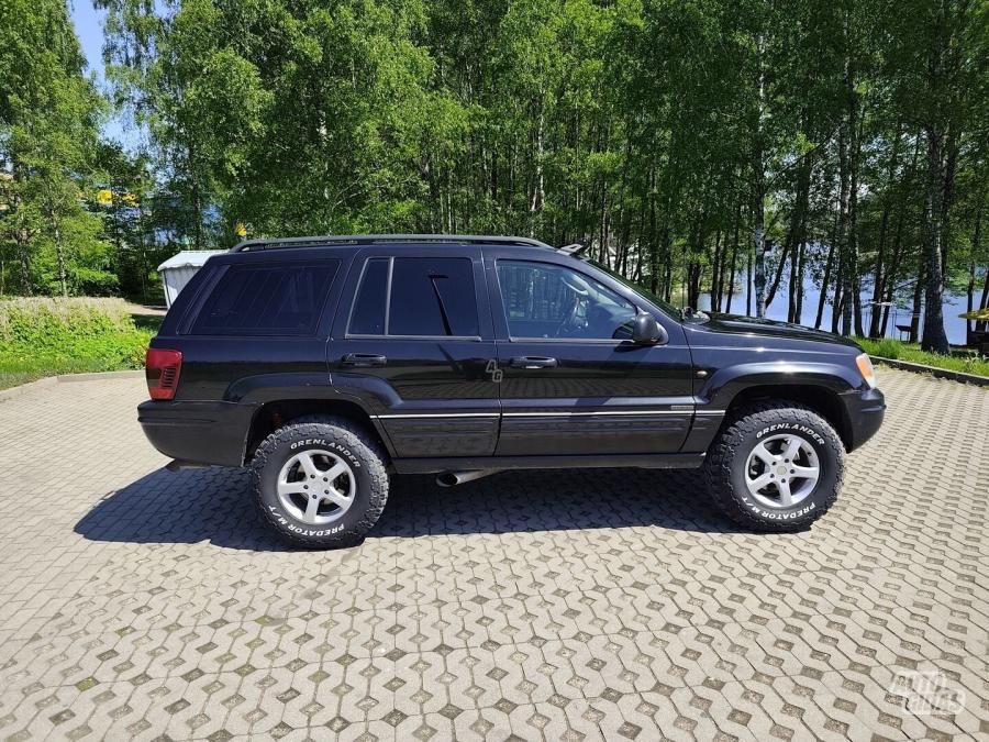 Black Jeep Grand Cherokee 2004 in Moletai, with an engine capacity of 2.70 L and mileage of 400 thousand km for 3100 €, photo 3 on AUTOMOTO.COM.LV