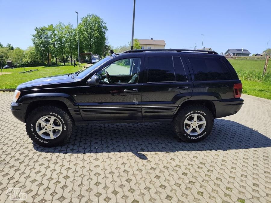 Black Jeep Grand Cherokee 2004 in Moletai, with an engine capacity of 2.70 L and mileage of 400 thousand km for 3100 €, photo 4 on AUTOMOTO.COM.LV