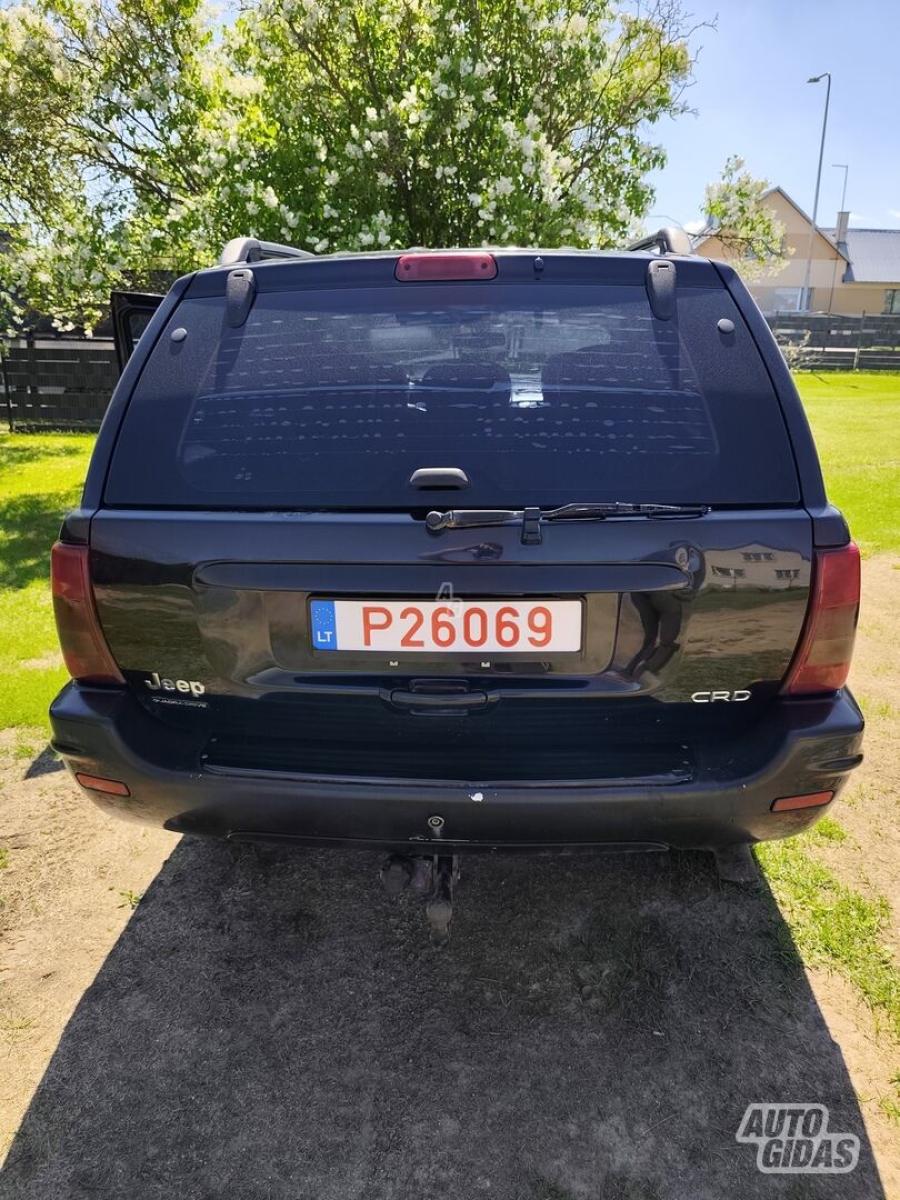 Black Jeep Grand Cherokee 2004 in Moletai, with an engine capacity of 2.70 L and mileage of 400 thousand km for 3100 €, photo 5 on AUTOMOTO.COM.LV