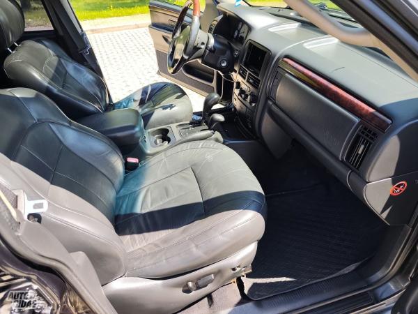 Black Jeep Grand Cherokee 2004 in Moletai, with an engine capacity of 2.70 L and mileage of 400 thousand km for 3100 €, photo 8 on AUTOMOTO.COM.LV