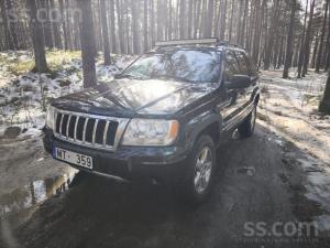 Melns Jeep Grand Cherokee 2004 Rīga, ar dzinēja tilpumu 2.70 L un nobraukumu 354 tūkst. km par 3300 €, foto  vietnē AUTOMOTO.COM.LV