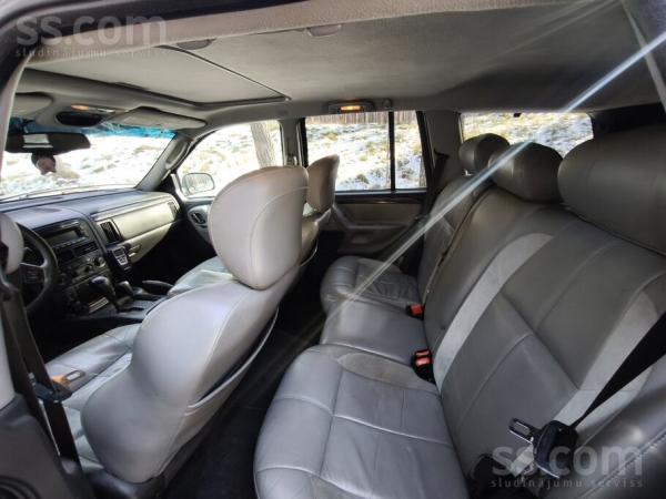 Melns Jeep Grand Cherokee 2004 Rīga, ar dzinēja tilpumu 2.70 L un nobraukumu 354 tūkst. km par 3300 €, foto 6 vietnē AUTOMOTO.COM.LV