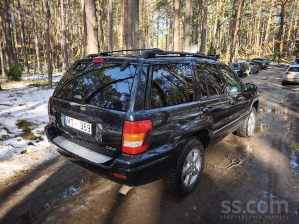 Melns Jeep Grand Cherokee 2004 Rīga, ar dzinēja tilpumu 2.70 L un nobraukumu 354 tūkst. km par 3250 €, foto 3 vietnē AUTOMOTO.COM.LV